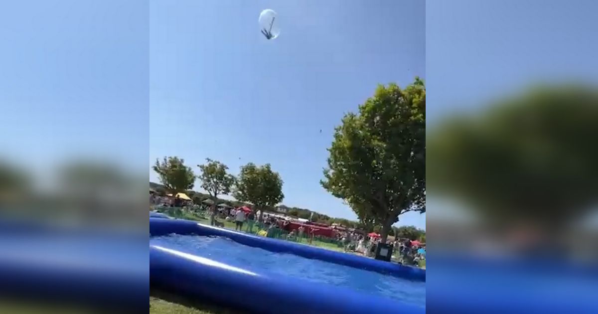 Boy filmed falling from the sky in inflatable zorb…