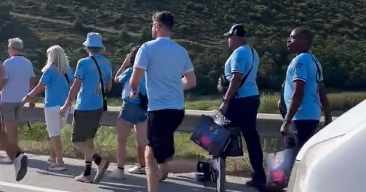 Man City fans walk on motorway to get to Champions…