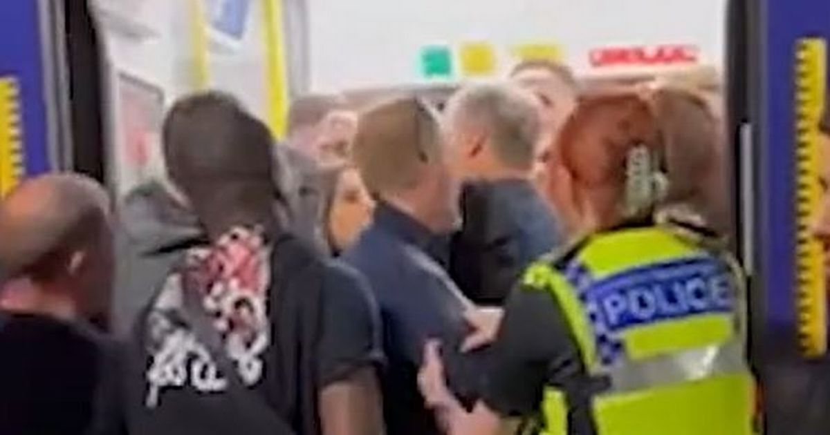 Passengers desperately squeeze onto packed out last…