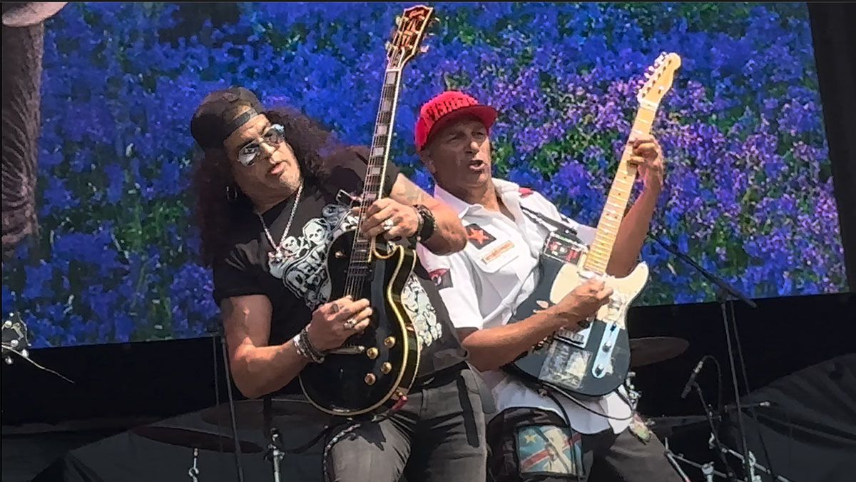 Watch Tom Morello and Slash battle for six-string…