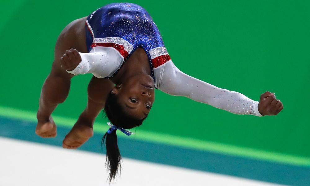 Simone Biles reaches new heights with all-around…