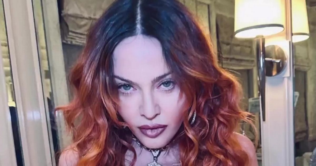 Madonna's son David Banda looks downcast as he breaks…