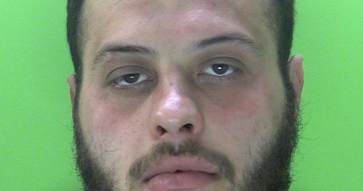 Man jailed for dangerous driving after climbing over…