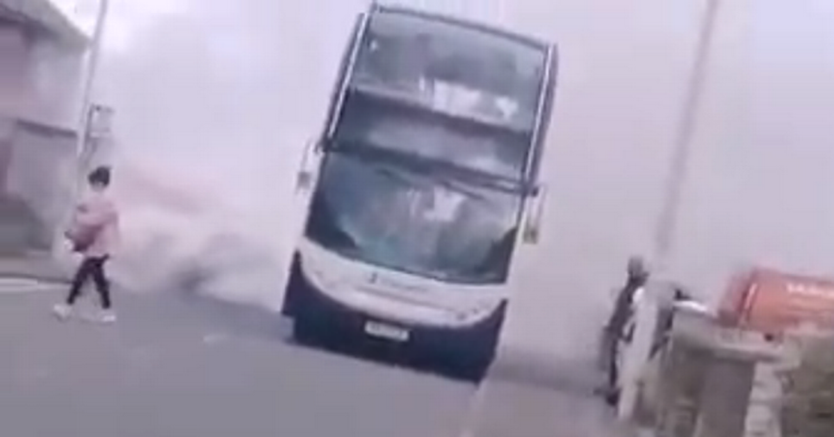 Bus catches fire with smoke billowing out on…