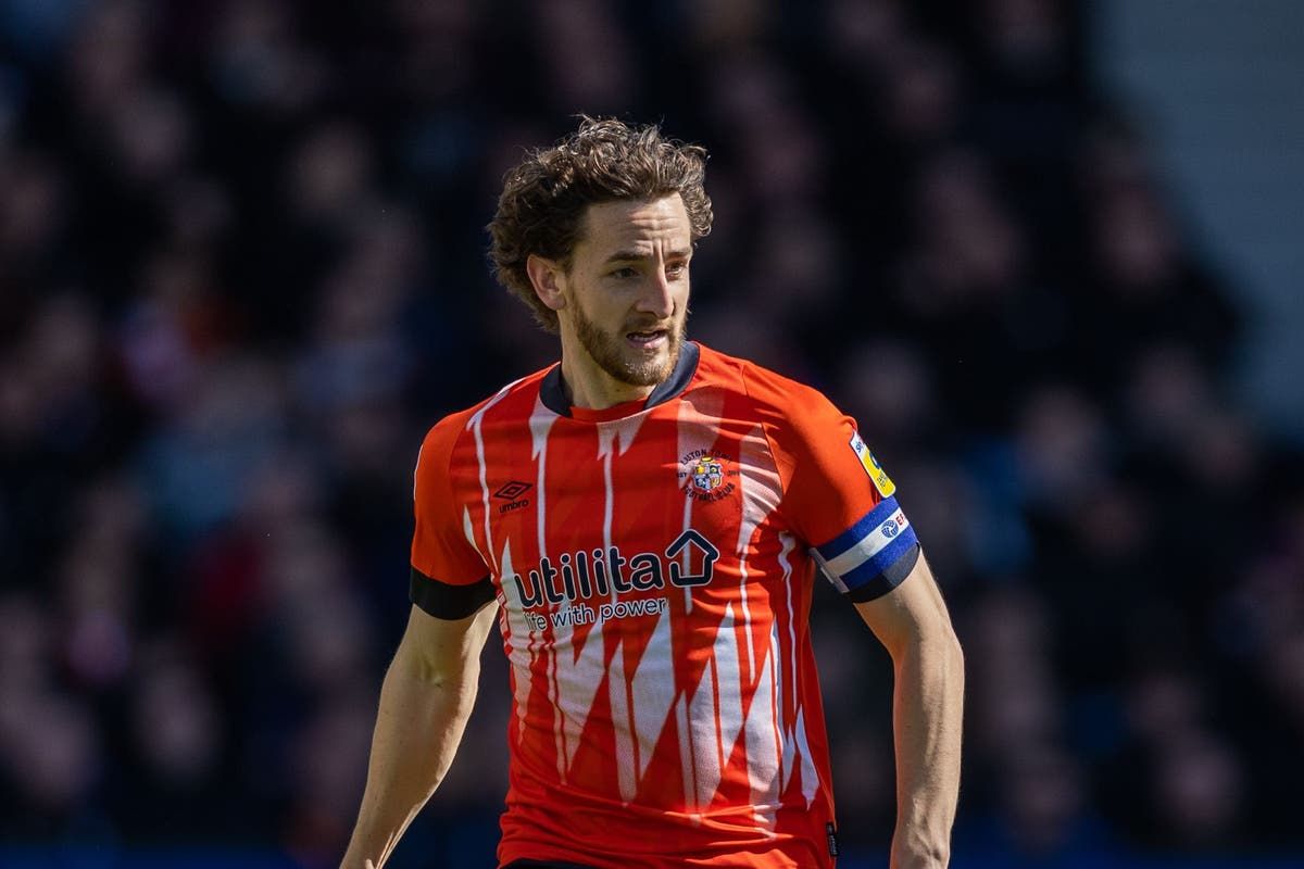 Tom Lockyer agrees new Luton deal after making full…