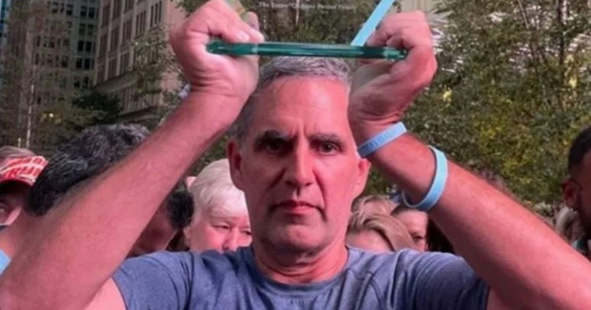 QAnon cult leader Michael Protzman who claimed JFK was…