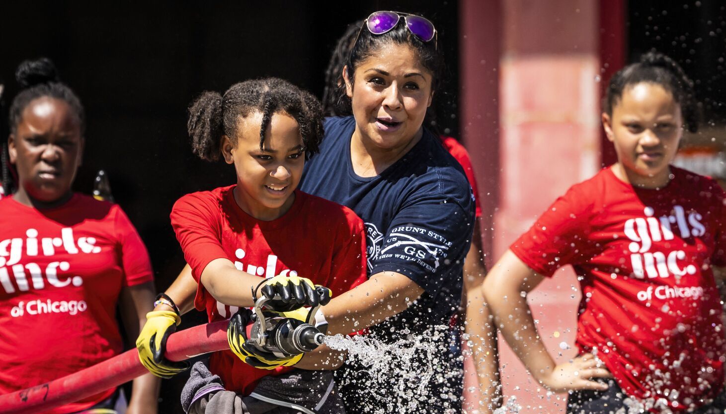 Fired up: Girls become firefighters for a day at Girls…