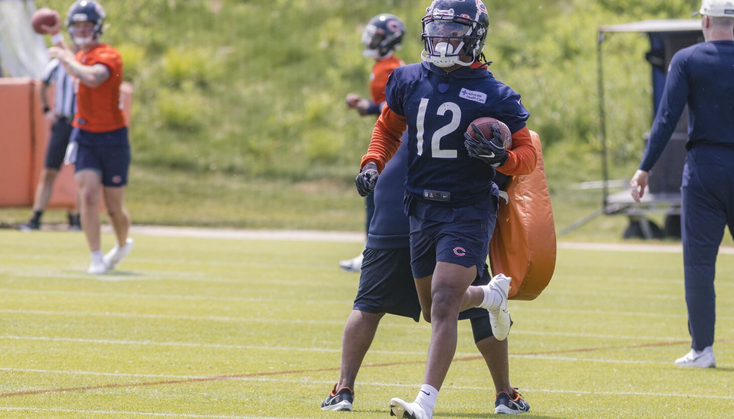 Devin Hester gives Bears WR Velus Jones advice as he…