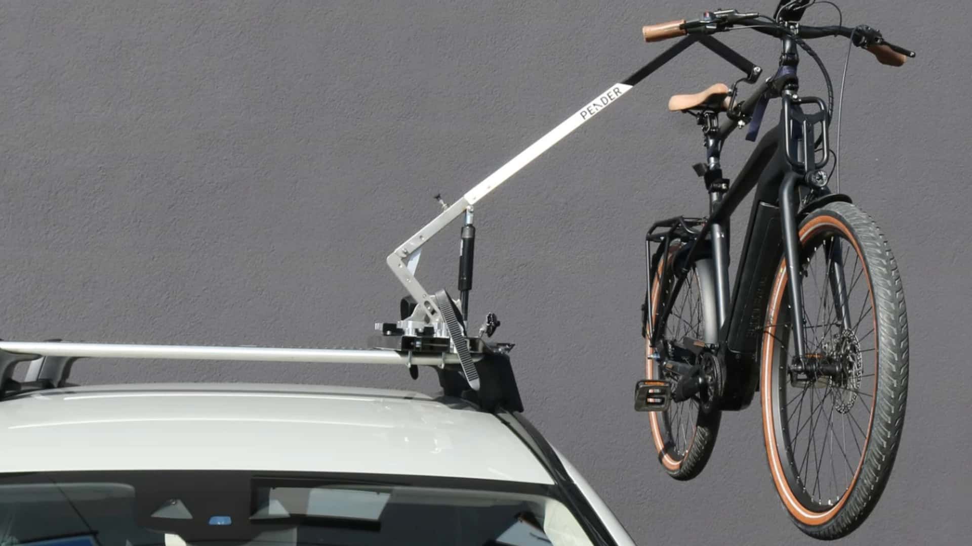 This E-Bike Rack Lifts Your Bike Onto Your Vehicle’s…