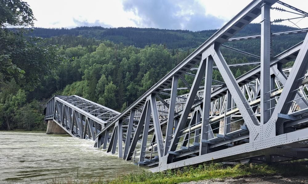 Storm Hans: railway bridge collapses in southern Norway