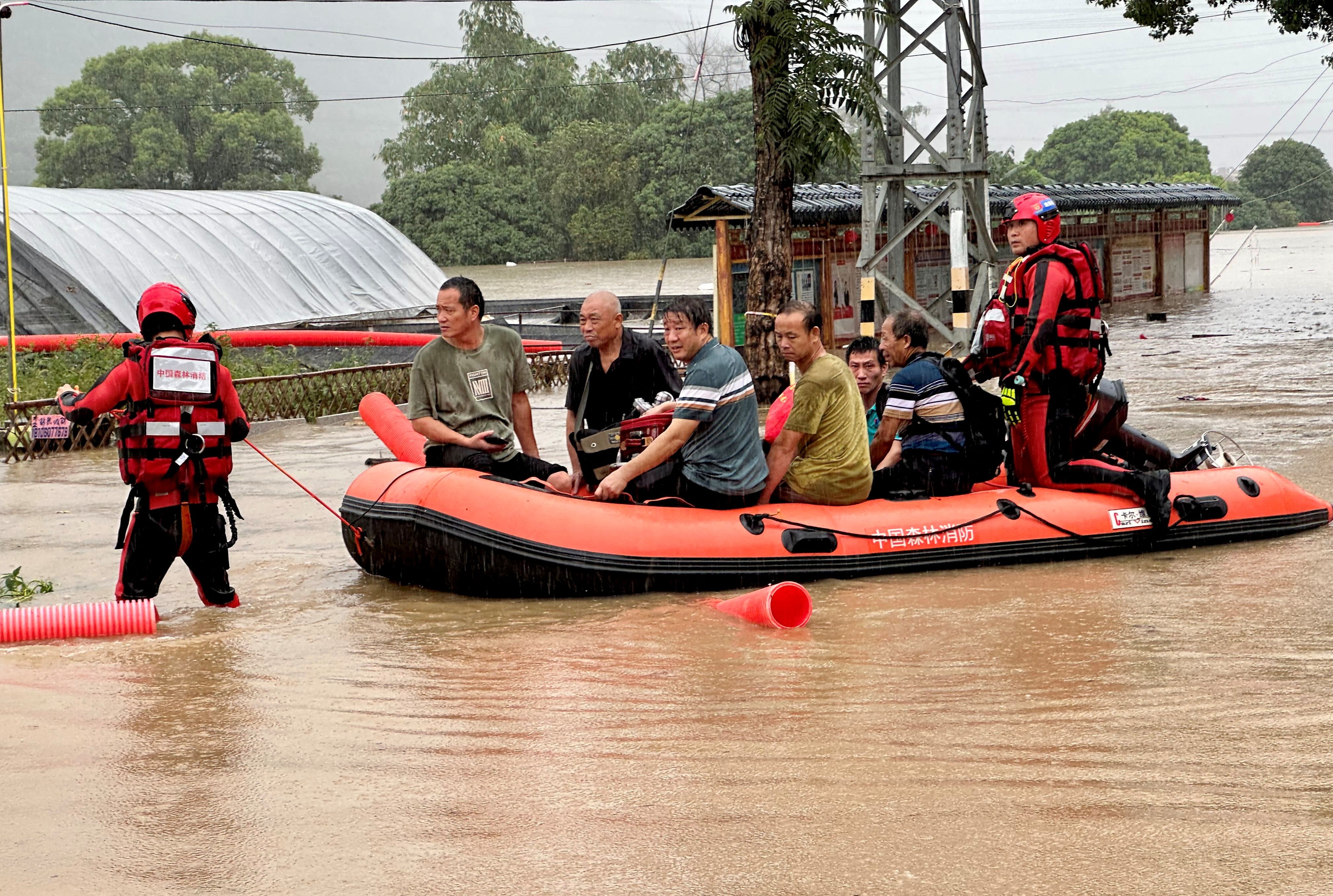Tens of thousands evacuated in China amid rain from…