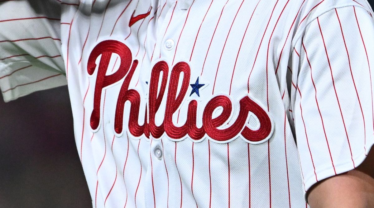 Sports Illustrated - A Phillies Fan and His Alligator…