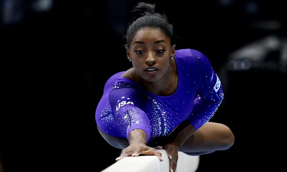 Simone Biles and Jake Jarman enjoy golden day at world…