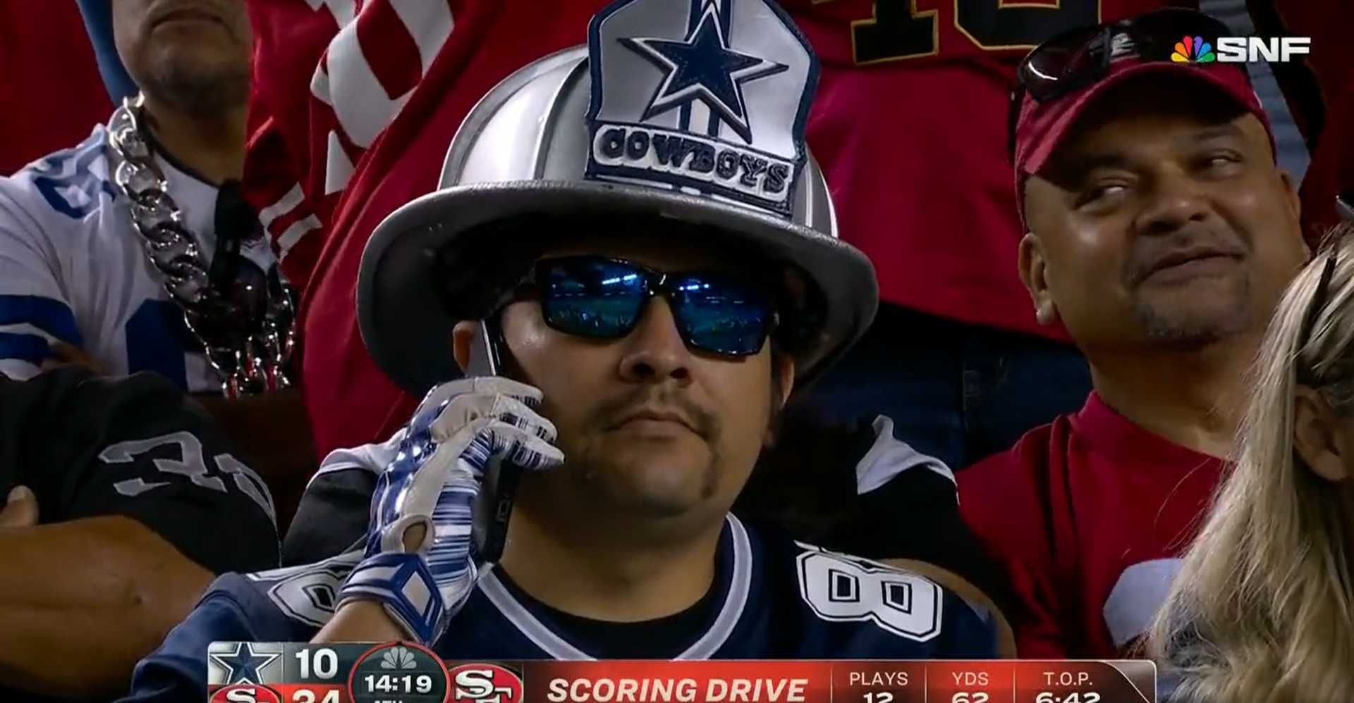 A Cowboys fan on the phone became an instant meme…
