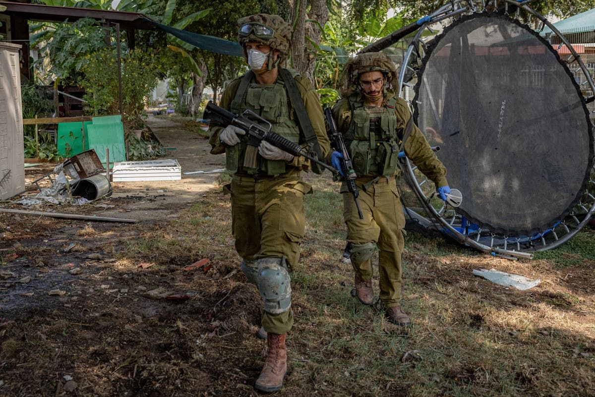 ‘Kfar Aza smells of death’: Inside the Israeli border…