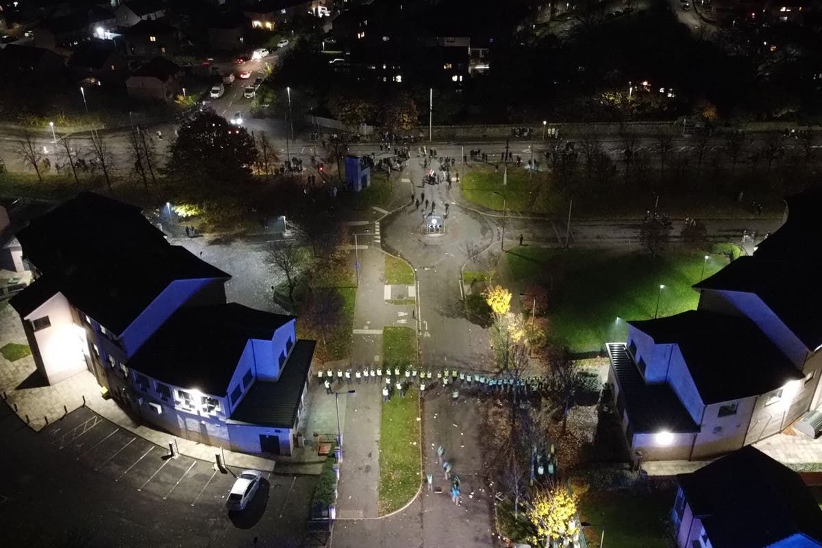 Drone footage shows ‘thugs’ aiming fireworks at riot…