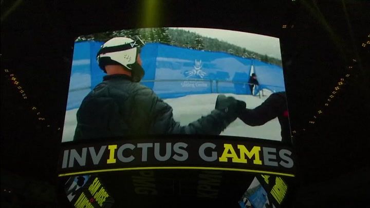 Prince Harry drops puck at ice hockey match in…