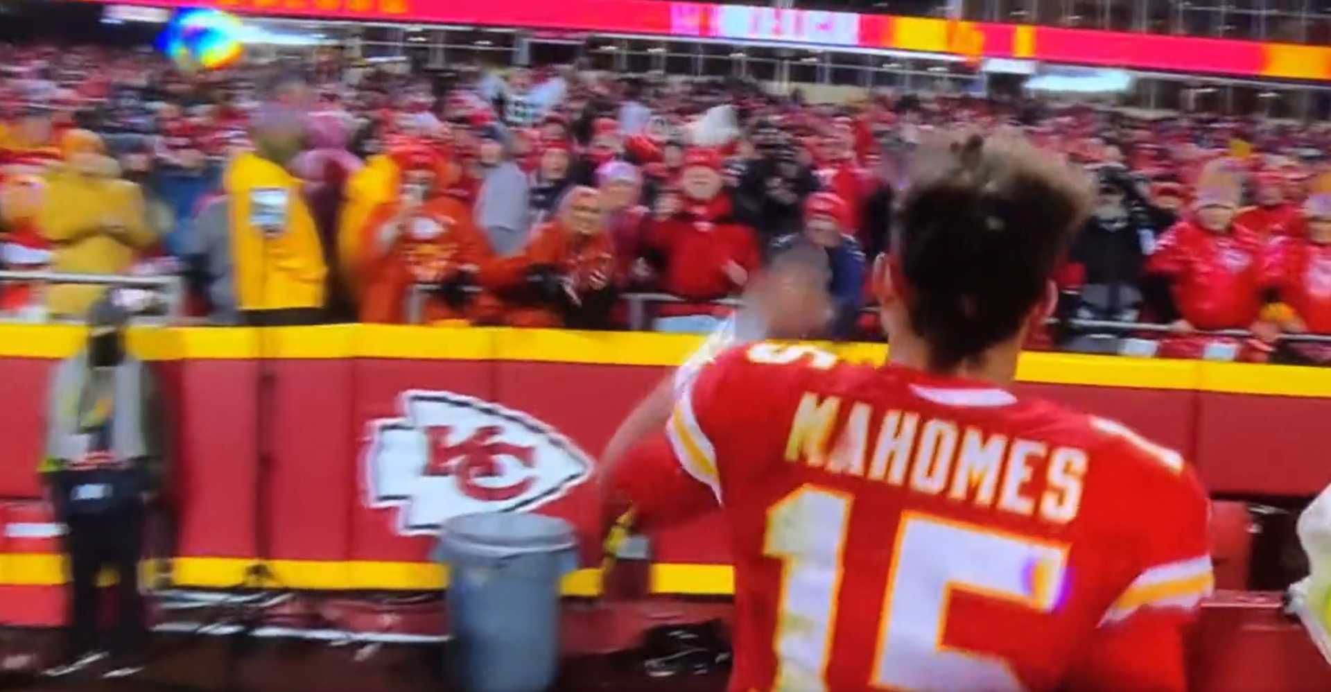 A Chiefs fan dropping Patrick Mahomes’s tossed gloves…