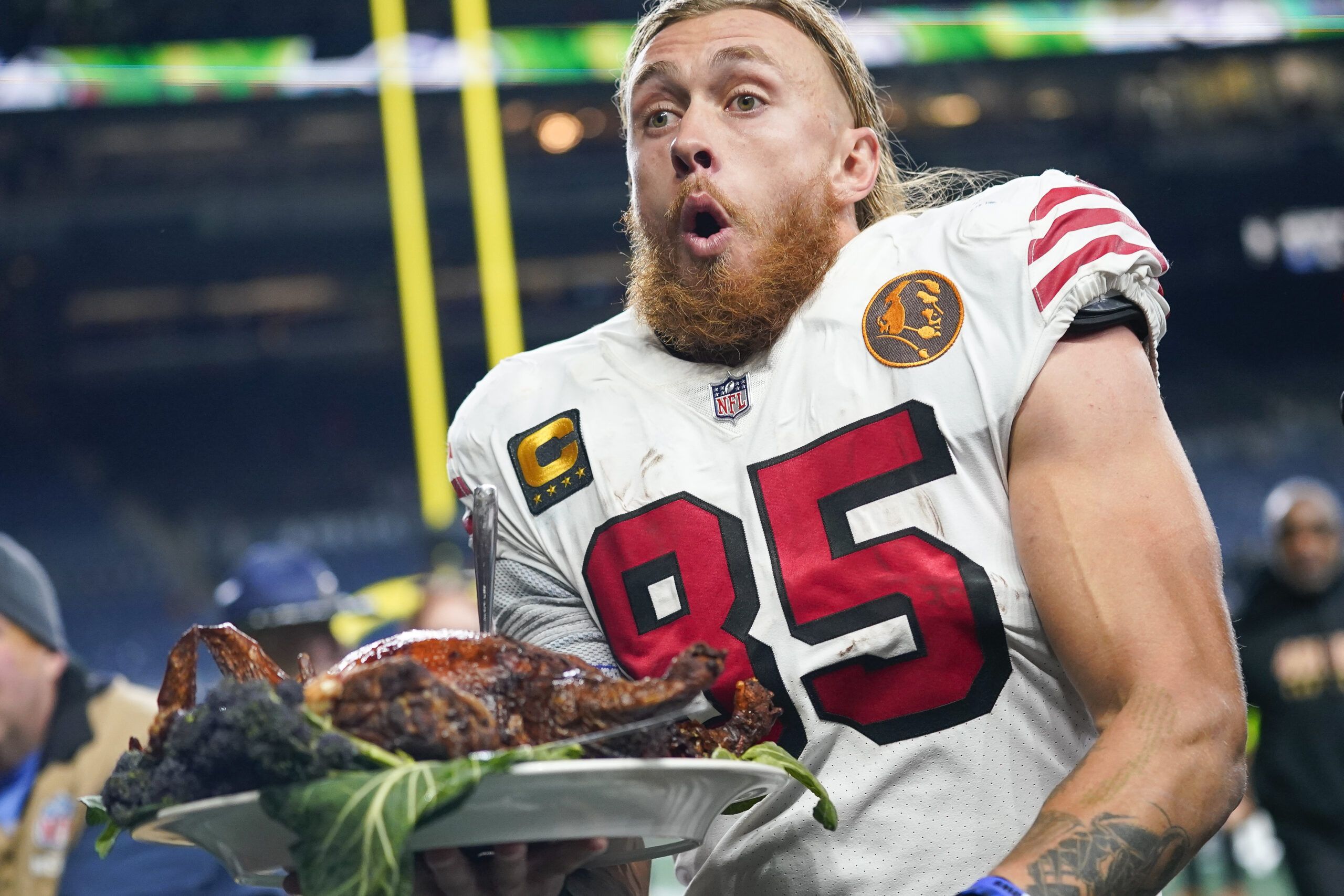 George Kittle casually took a whole turkey after…
