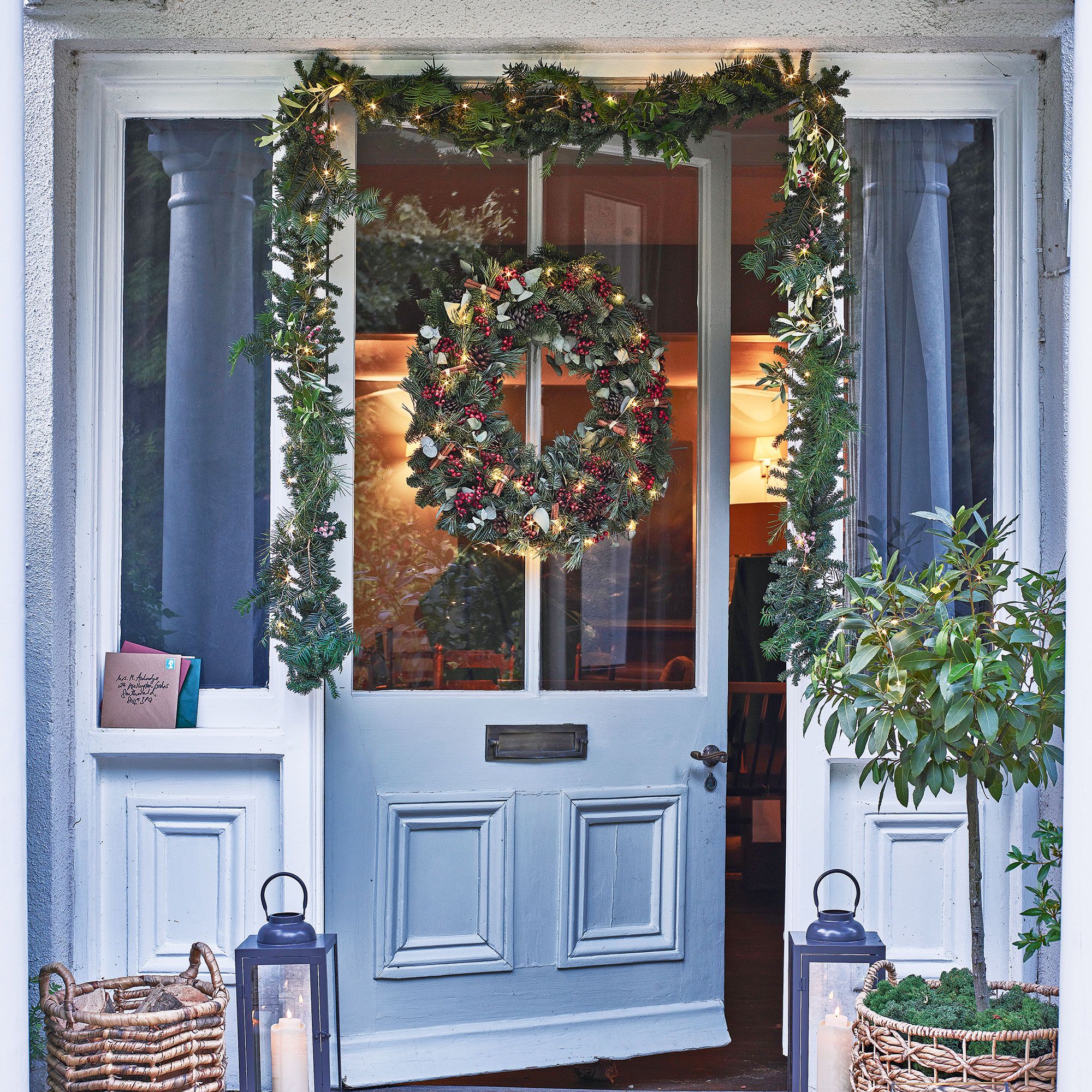 How to hang a garland around your front door for some…
