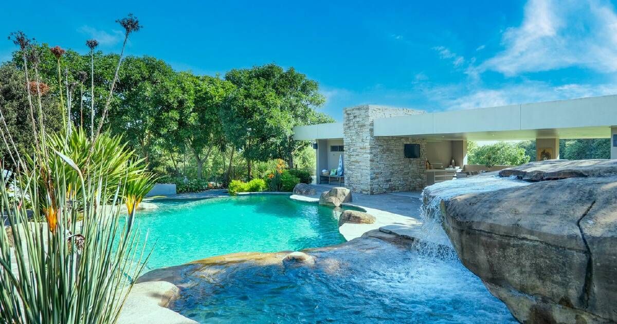 It's gone. Cardiff Heights home with three-tier pool…