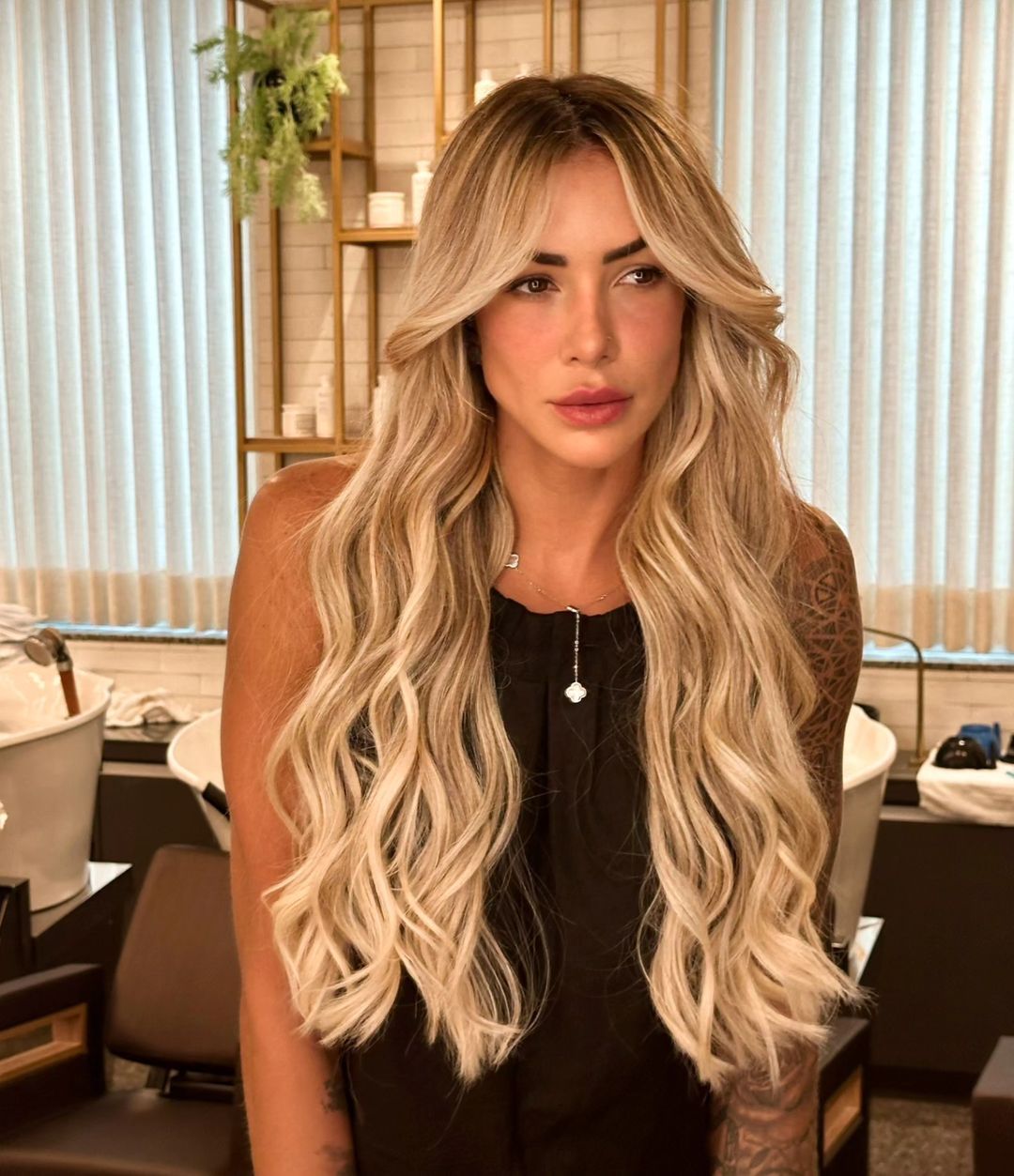 Thaisa Daher Shines in Elegant Brown Dress and Blonde…