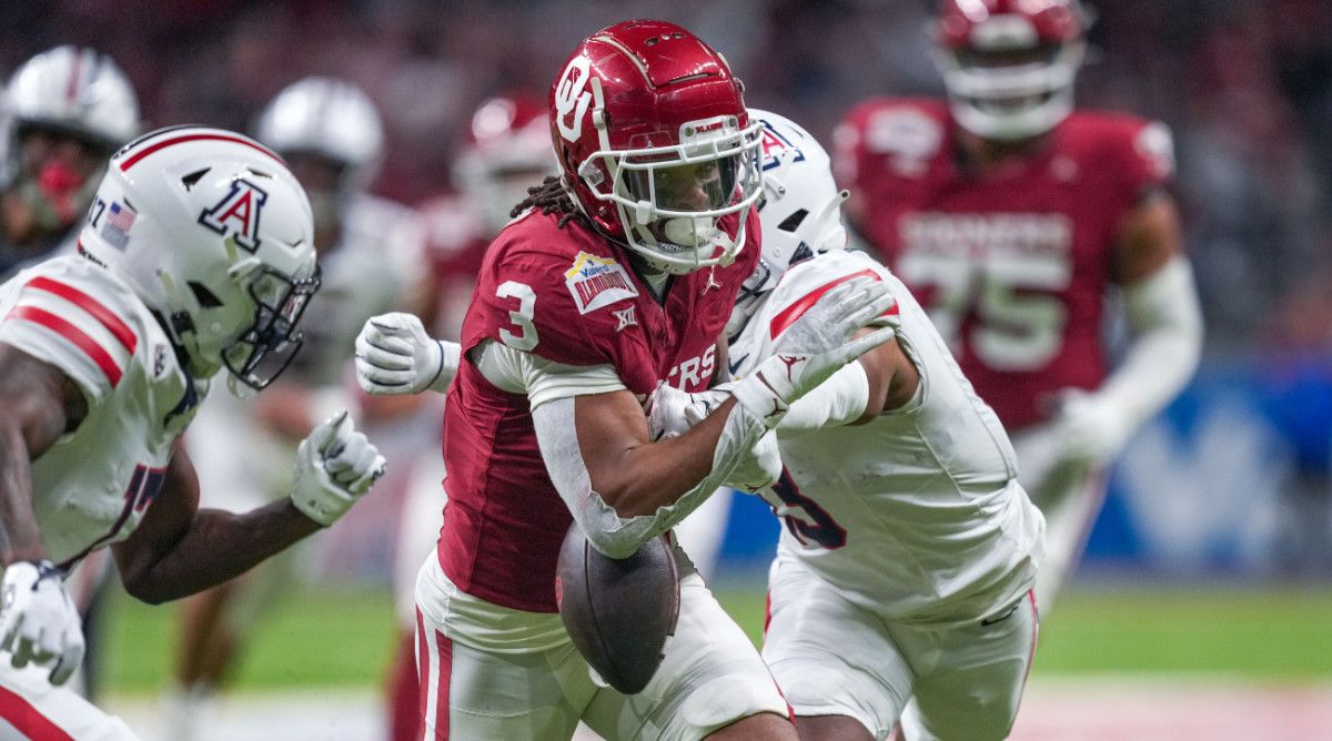 College Football Fans Roasted ESPN’s Cole Cubelic for…