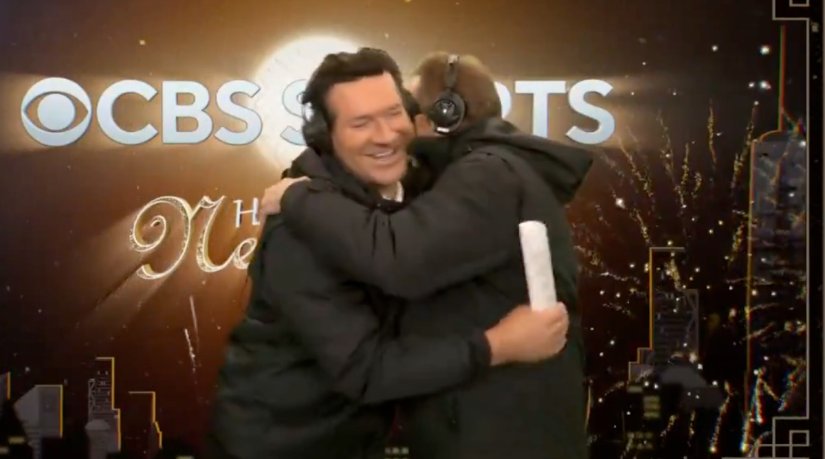 Sports Illustrated - Awkward Hug Between Tony Romo,…