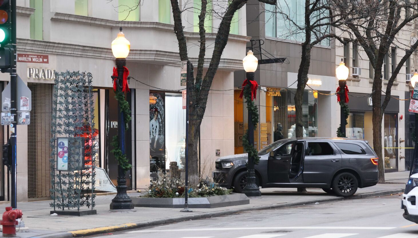 Suspect charged in officer shooting following Prada…