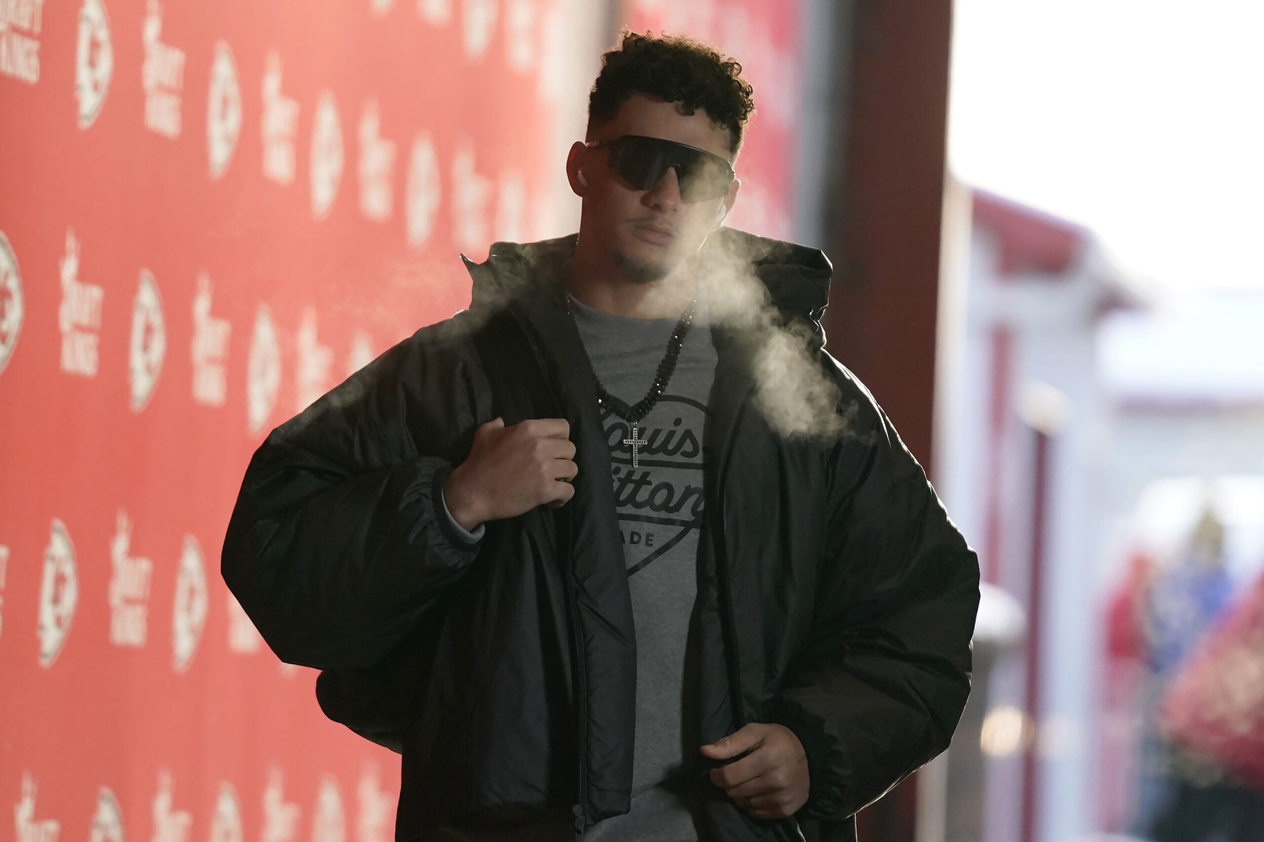 Patrick Mahomes stood alone in the frigid cold to…