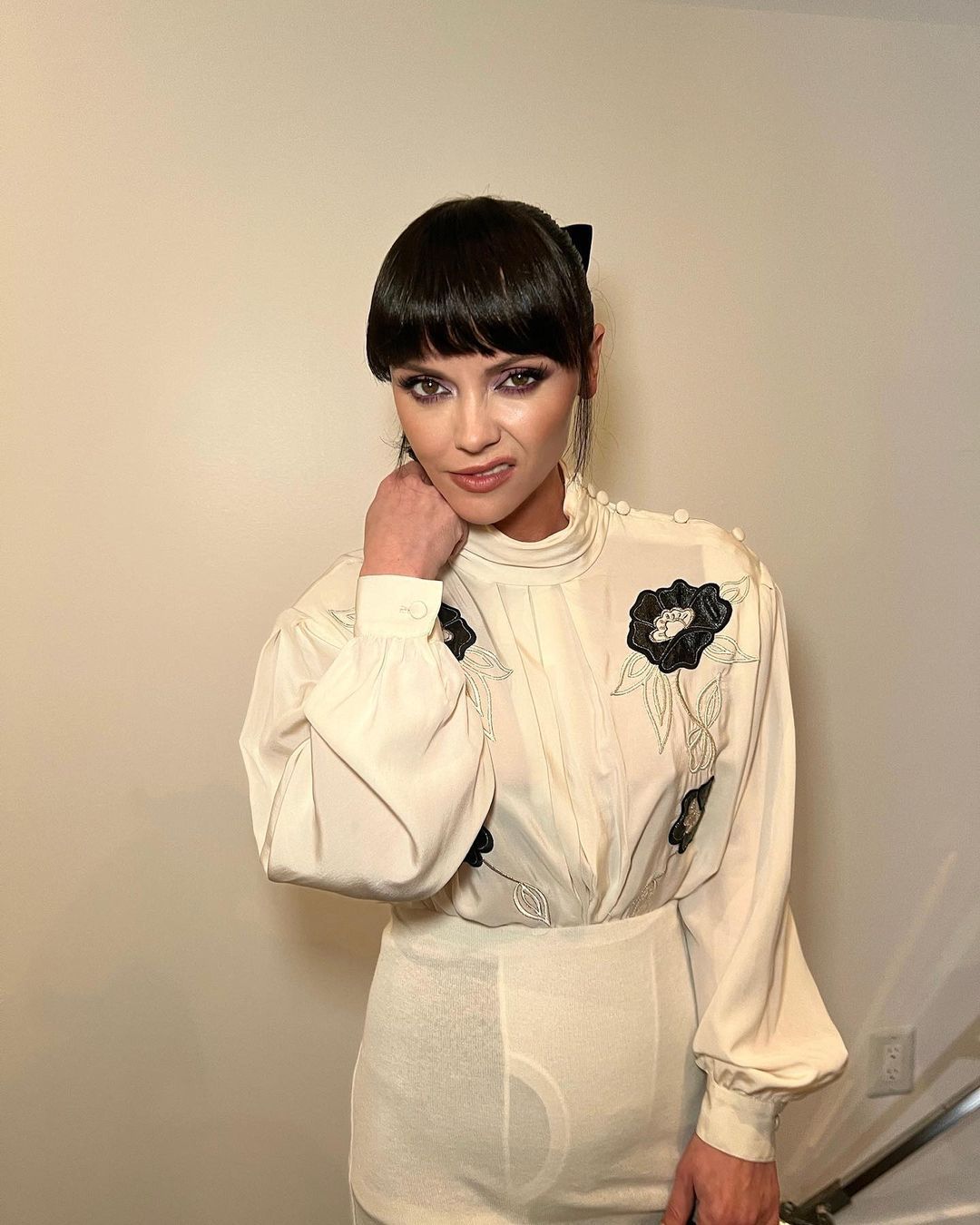 Chic Contrast: Christina Ricci's Timeless Fashion Blend