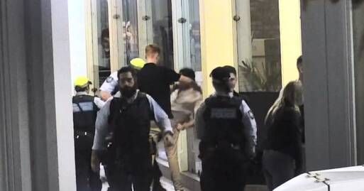 CCTV shows cop pull leg out from under alleged…