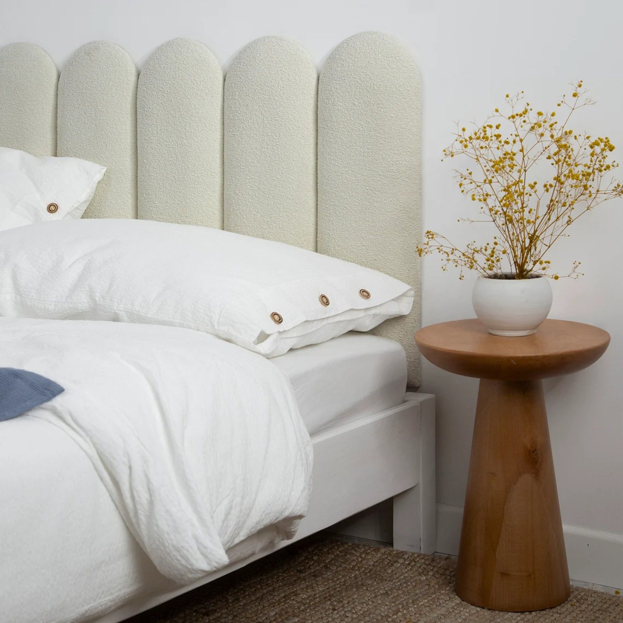 Boucle headboards are the latest 'it' bedroom trend