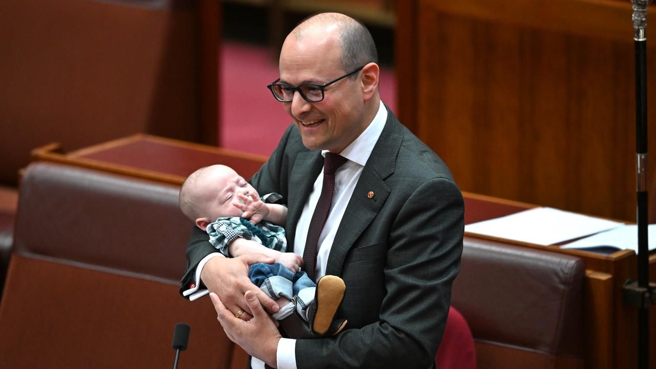 All smiles as proud father introduces newborn to Senate