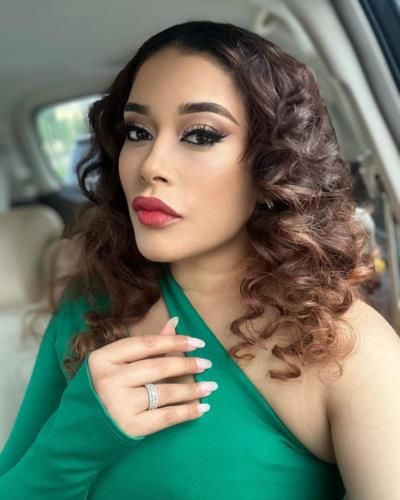 Adunni Ade Stuns in Chic Green Top and Sleek Black…