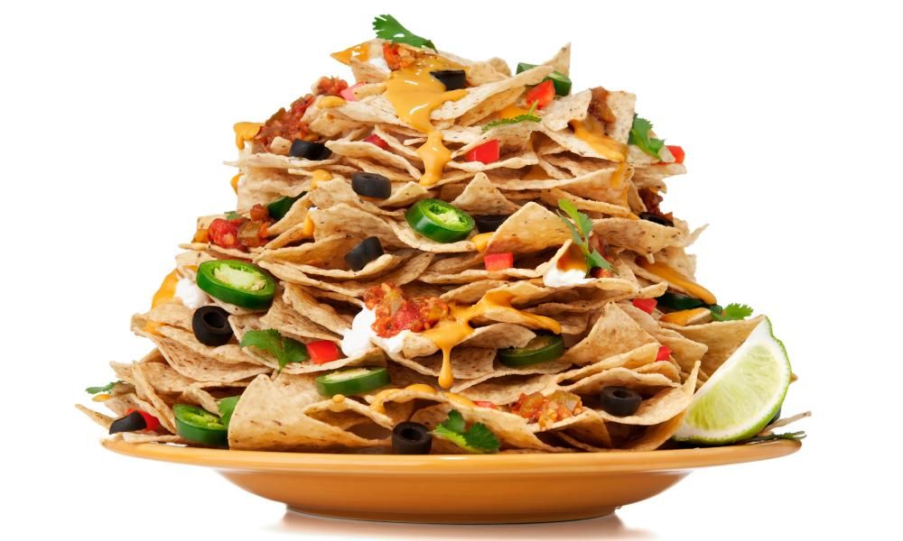 $60 for nachos at the Super Bowl?! Why is stadium food…