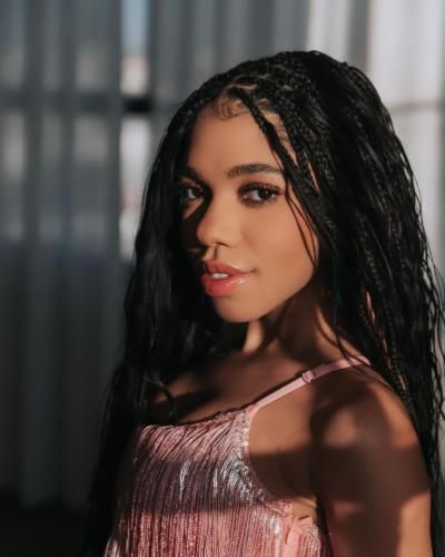 Teala Dunn Stuns In Pink Photoshoot, Exuding Grace And…