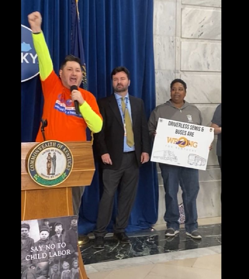 Labor activists standing against child labor and…