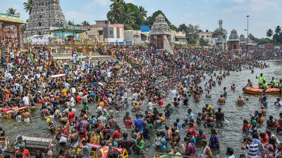 Thousands take a holy dip at the temple tank in…