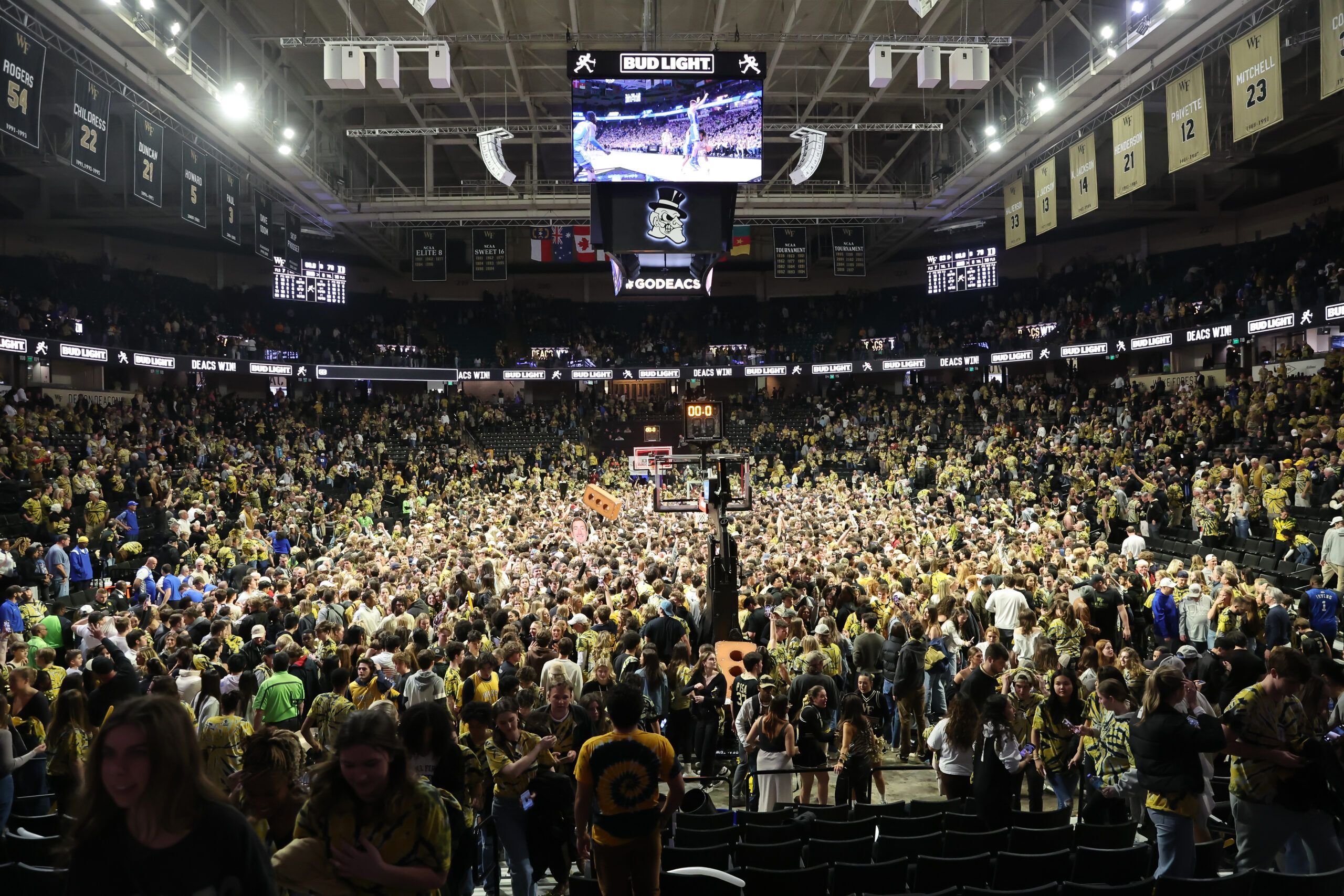 Wake Forest fans stormed the court after Duke upset…