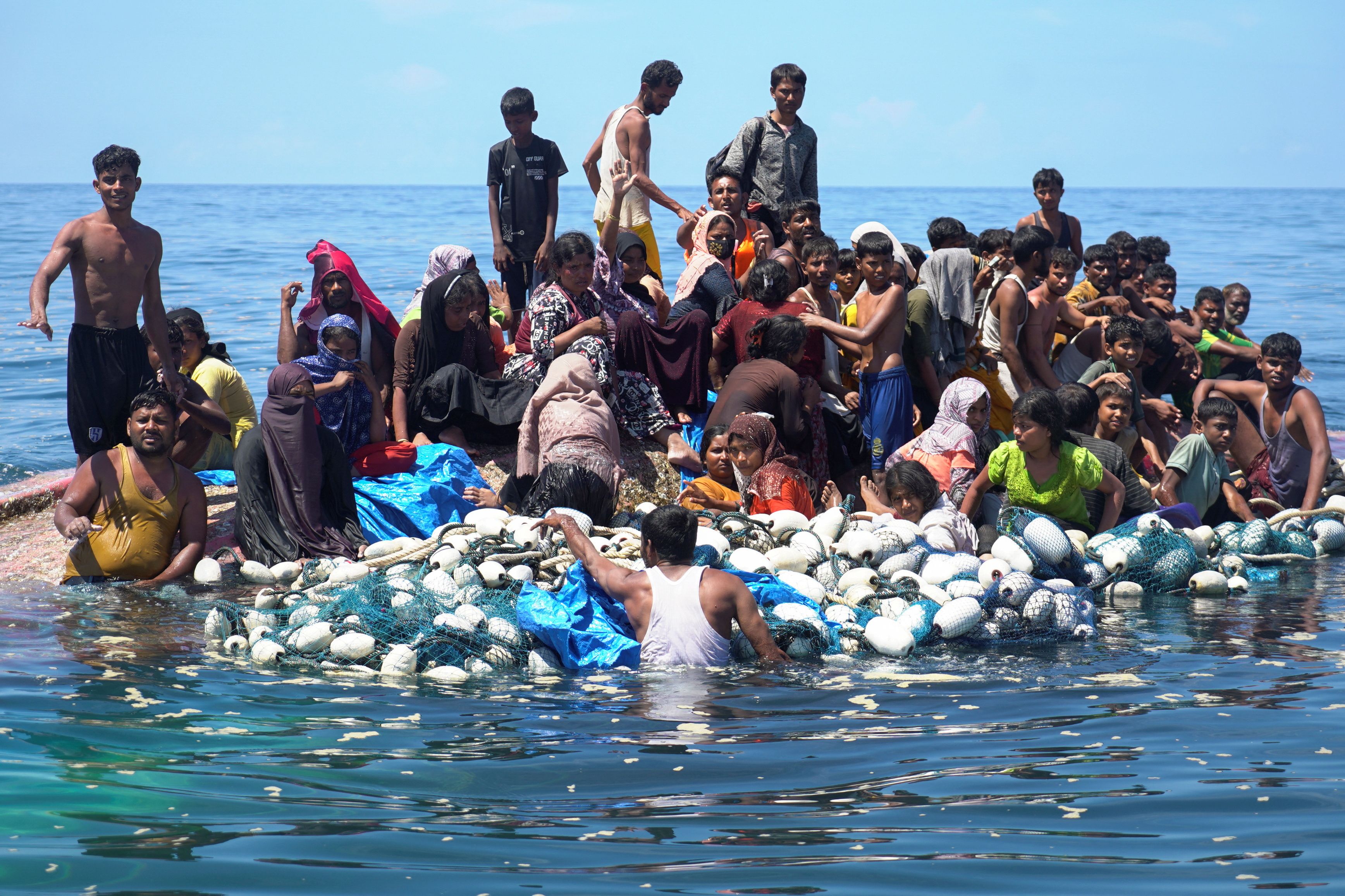 At least 69 Rohingya refugees rescued after boat…