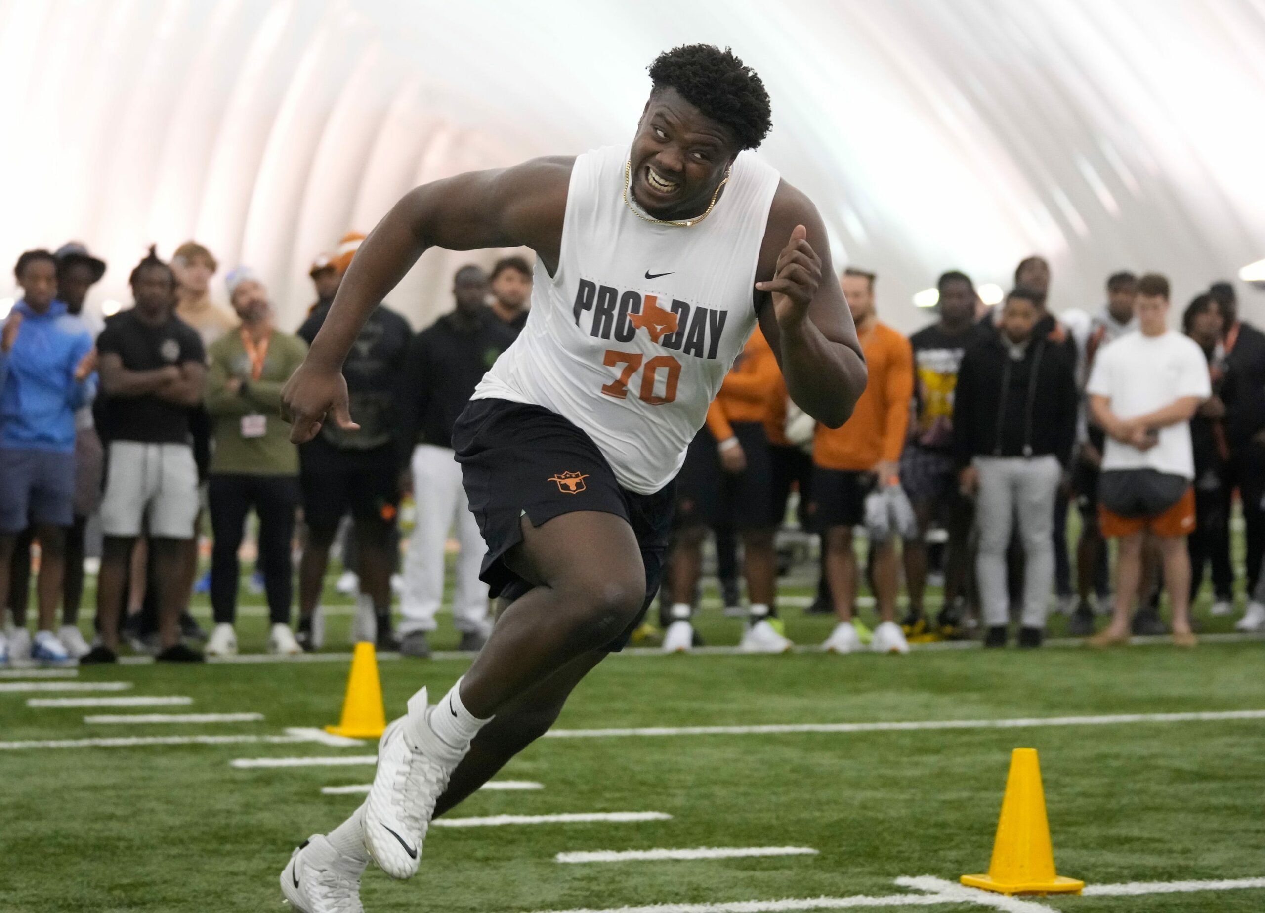 Texas RT Christian Jones gets hands-on work with…