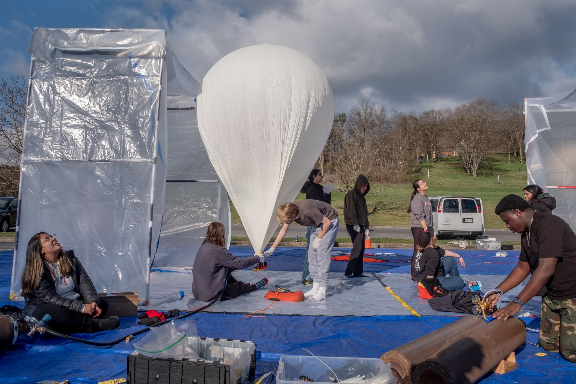 On eclipse day, hundreds of students will send up…
