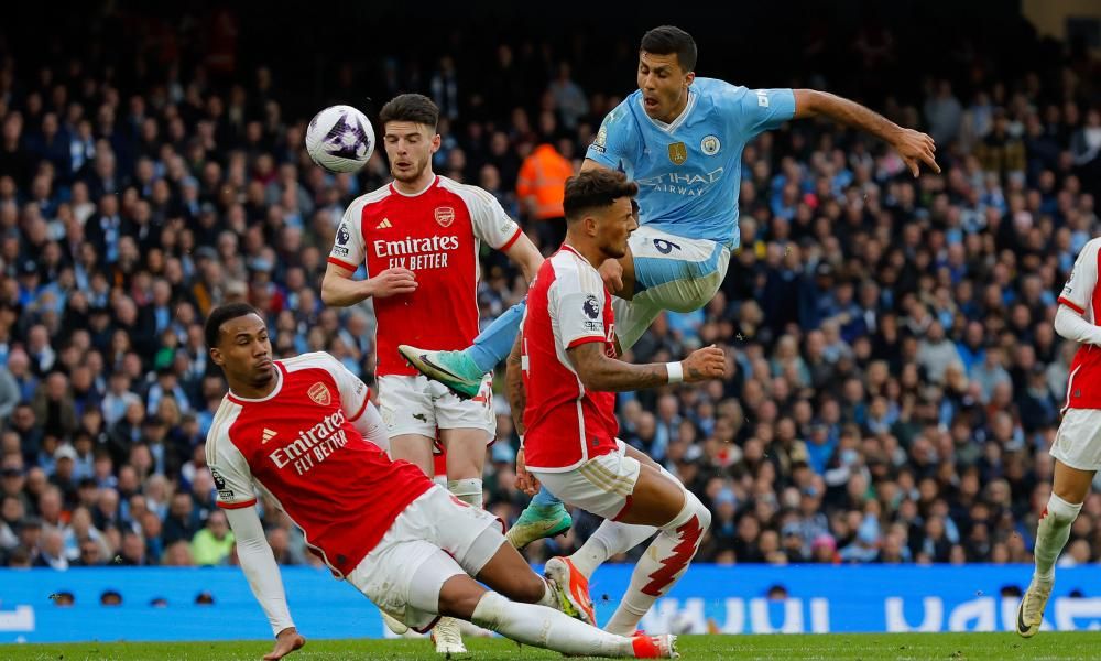 Arsenal hold Manchester City to leave Liverpool with…