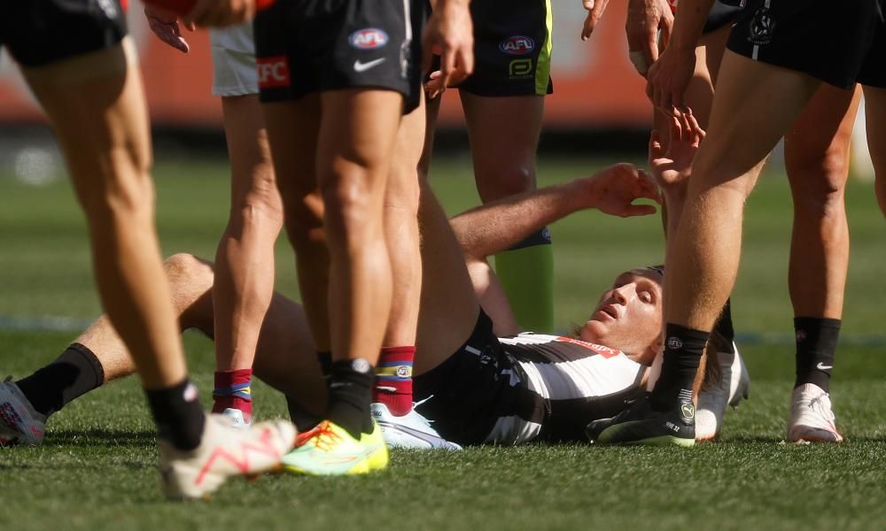 Collingwood’s Nathan Murphy forced to retire from AFL…