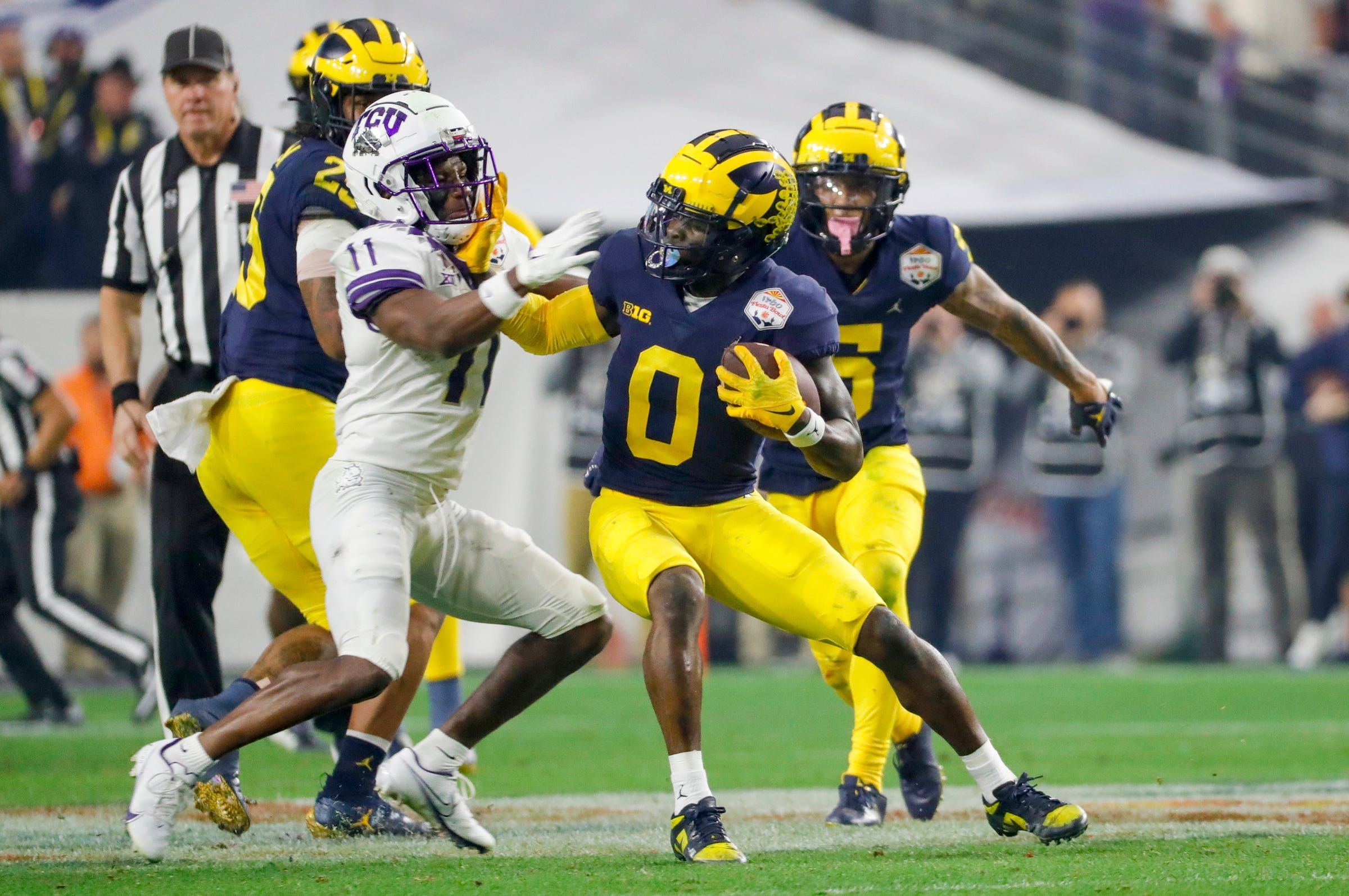 Washington Commanders select Michigan DB Mike…