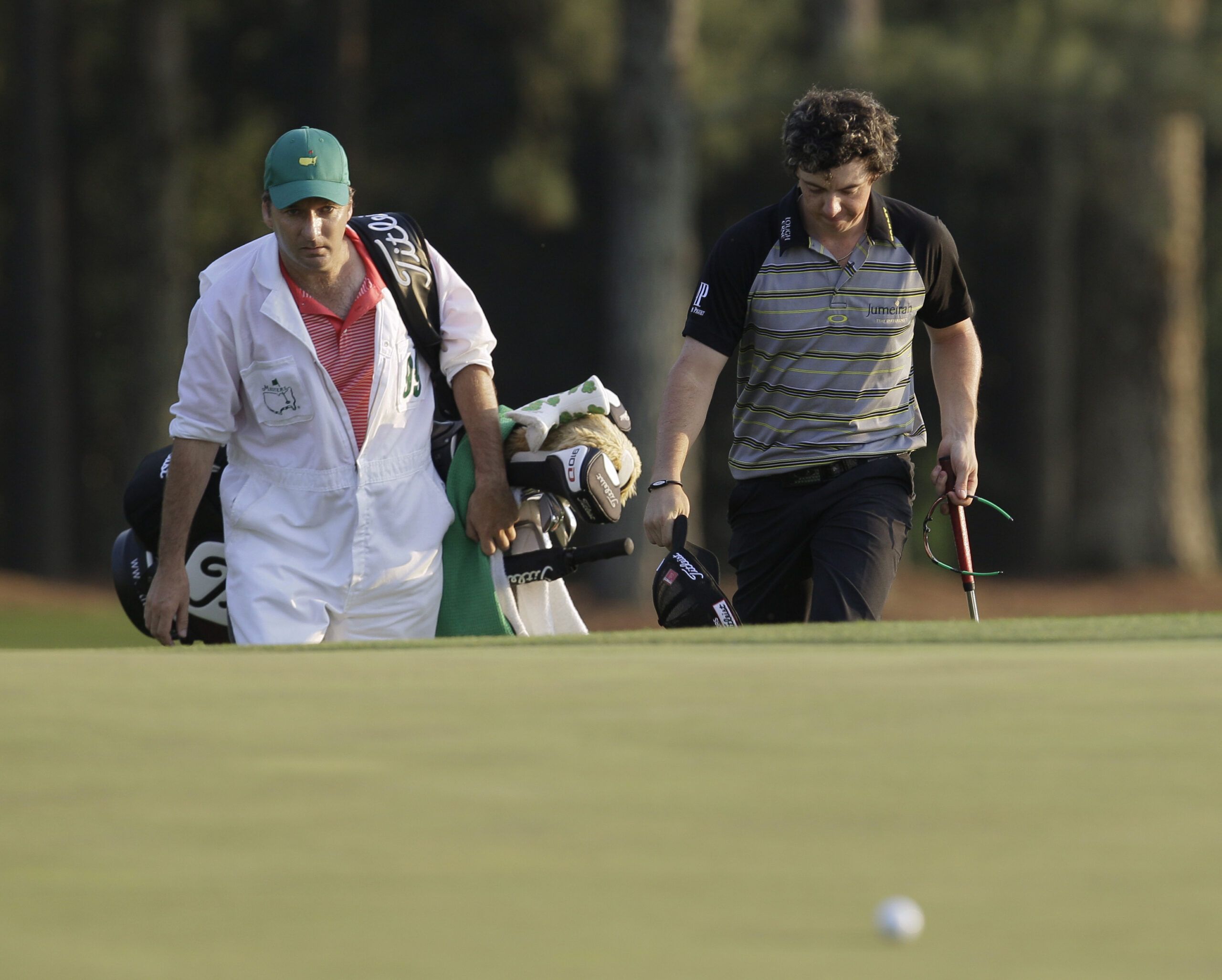 12 golfers have won three legs of the career Grand…