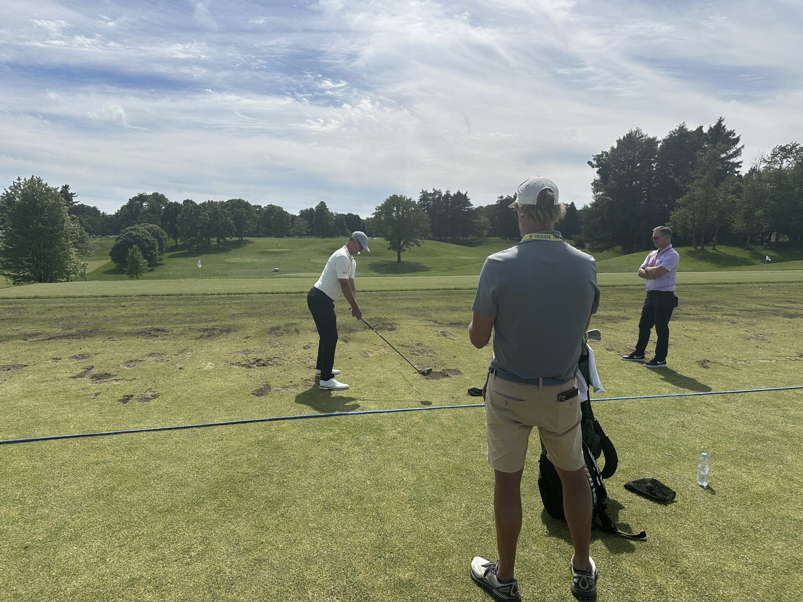 Adam Scott gets a lesson from CBS’s Trevor Immelman as…