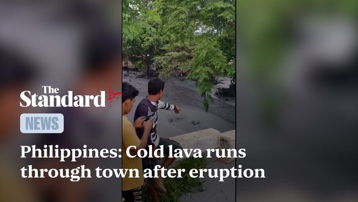 Watch as cold lava flows through a Philippines town