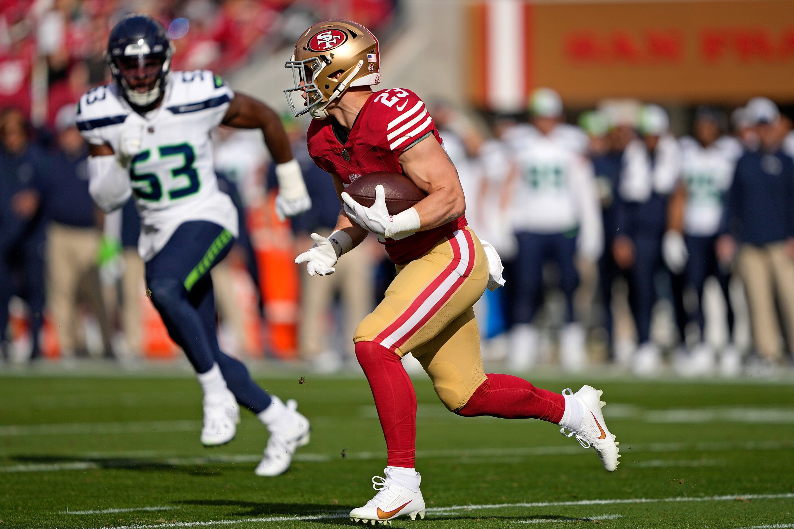NFC West Roundup: 49ers extend CMC, Matt Stafford…